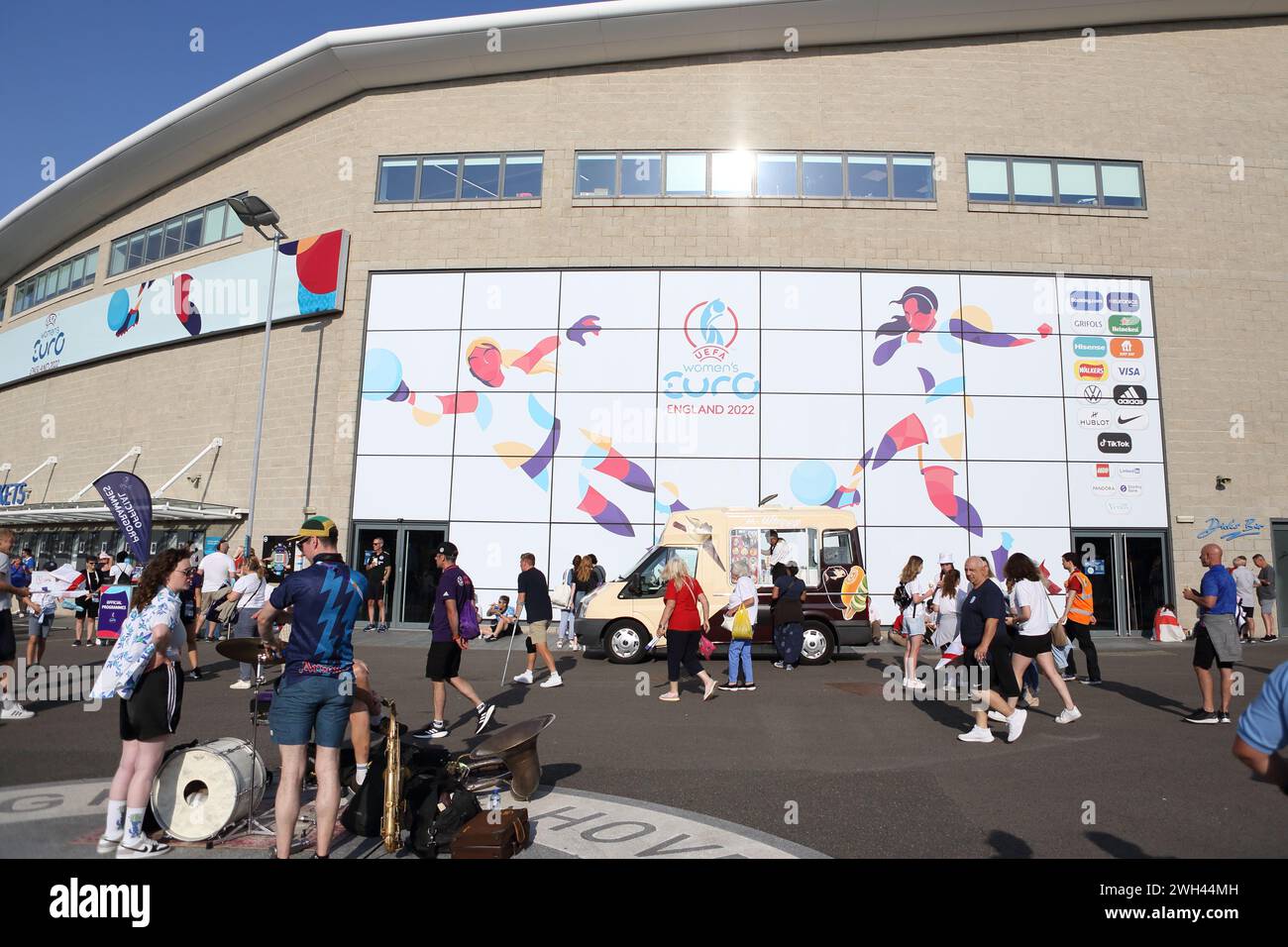 Fans outside stadium in front of tournament branding England v Spain ...