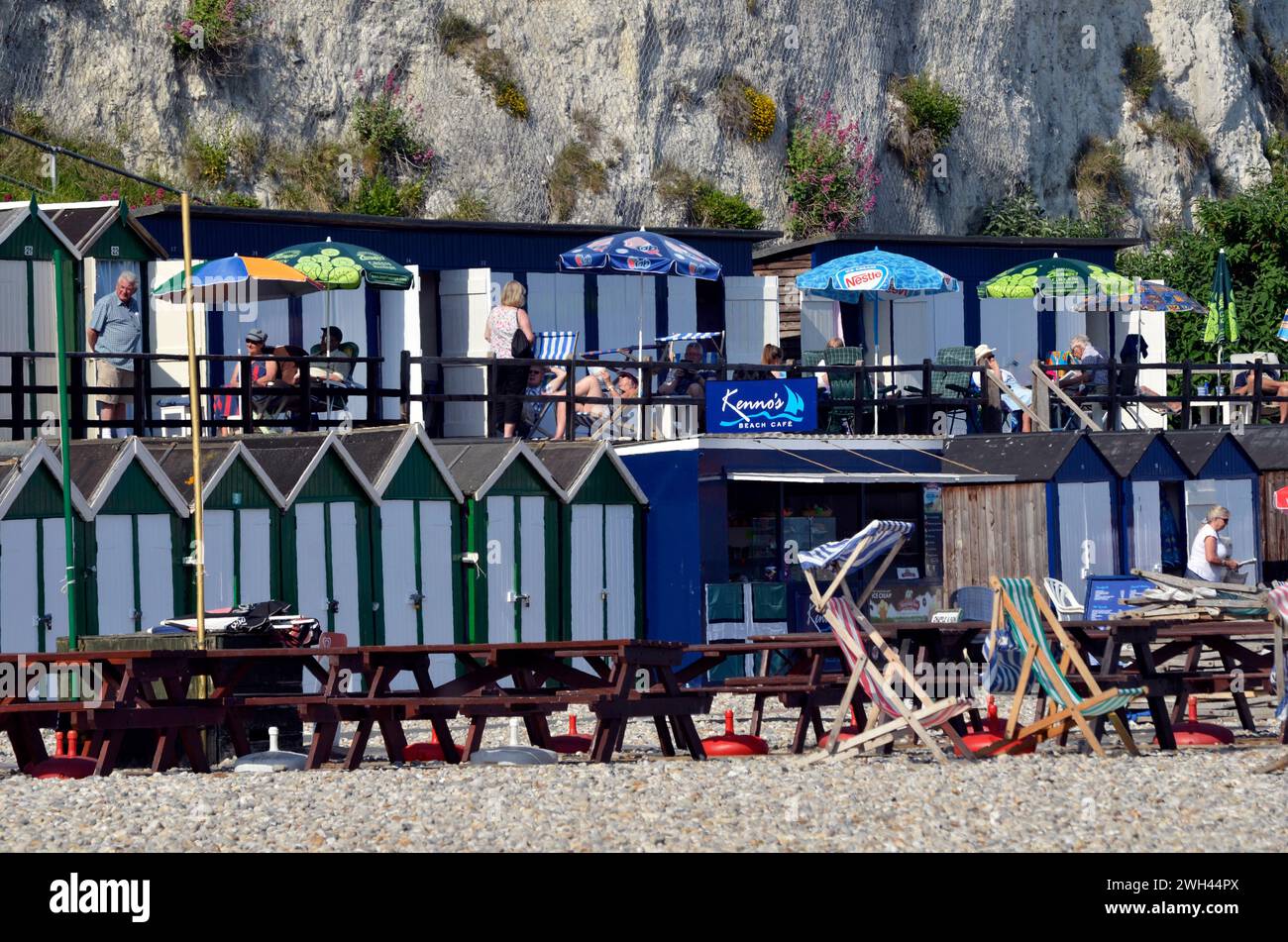 beach huts and cafe beer devon england Stock Photo - Alamy