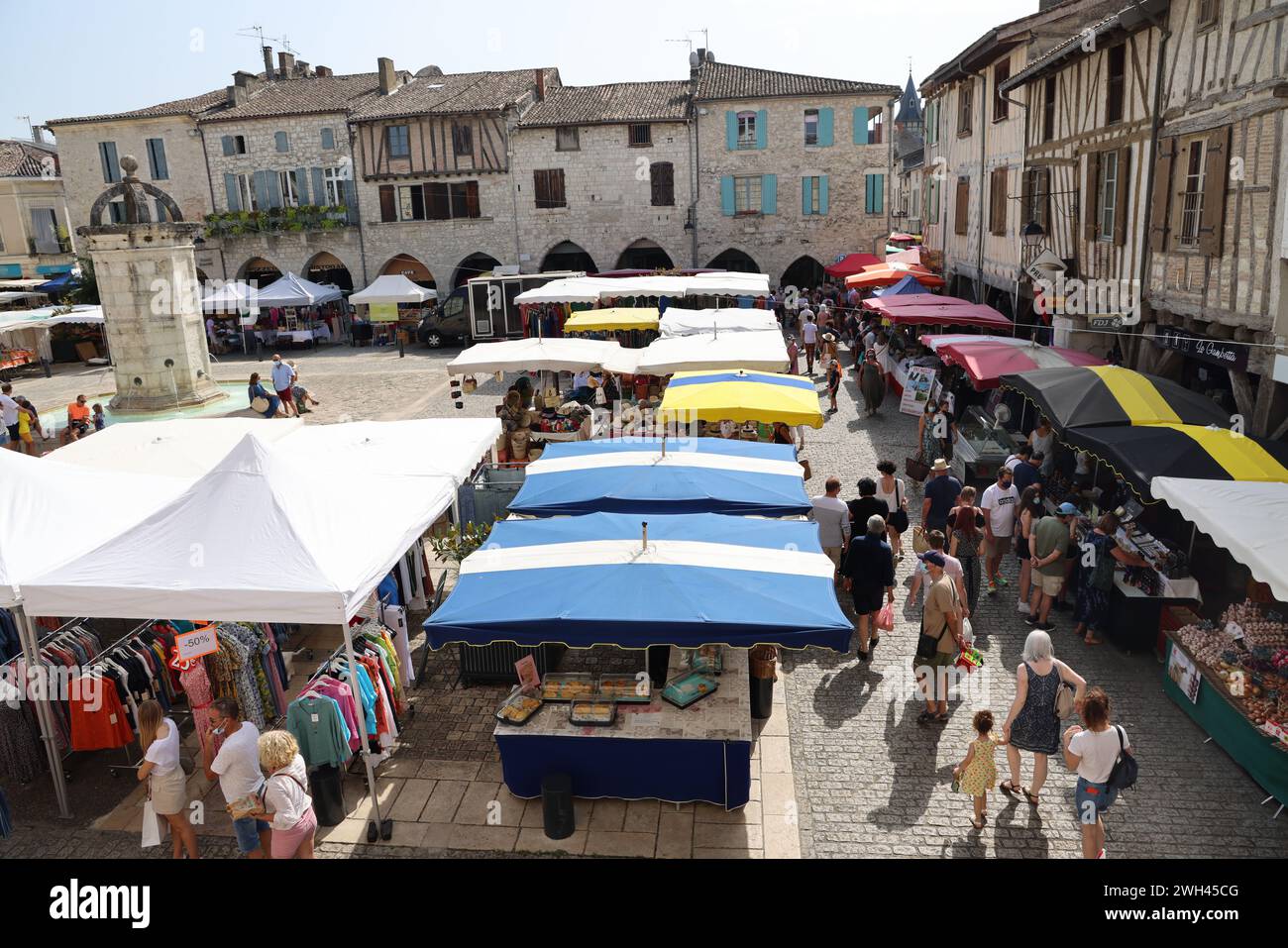 Eymet, the most English of French bastides. Market day on the central ...