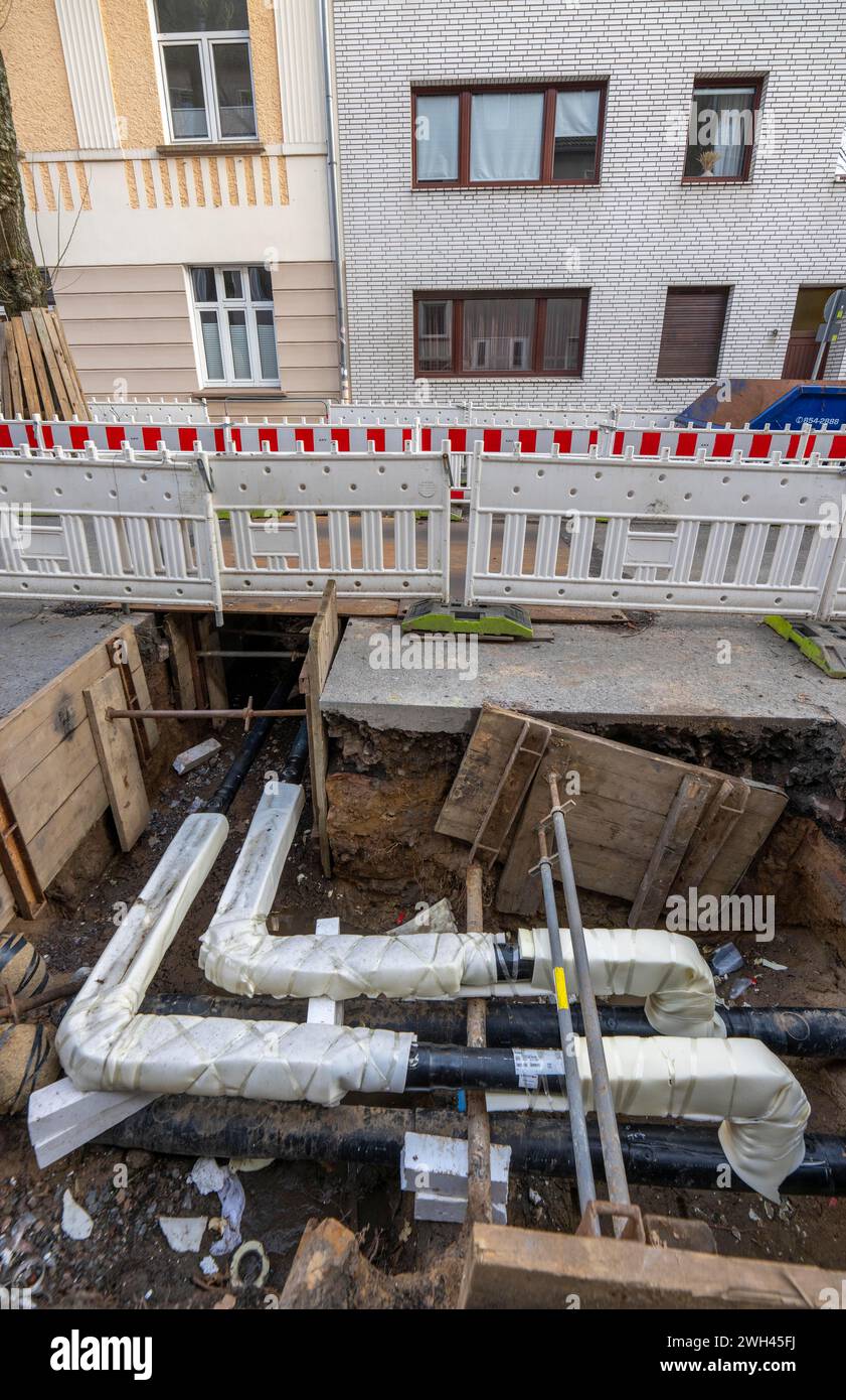 Construction site of a district heating house connection, pipes are ...