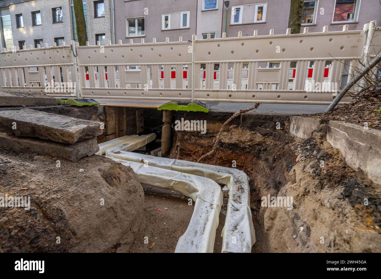 Construction site of a district heating house connection, pipes are ...
