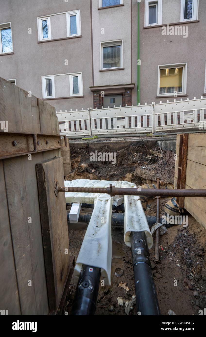 Construction site of a district heating house connection, pipes are ...