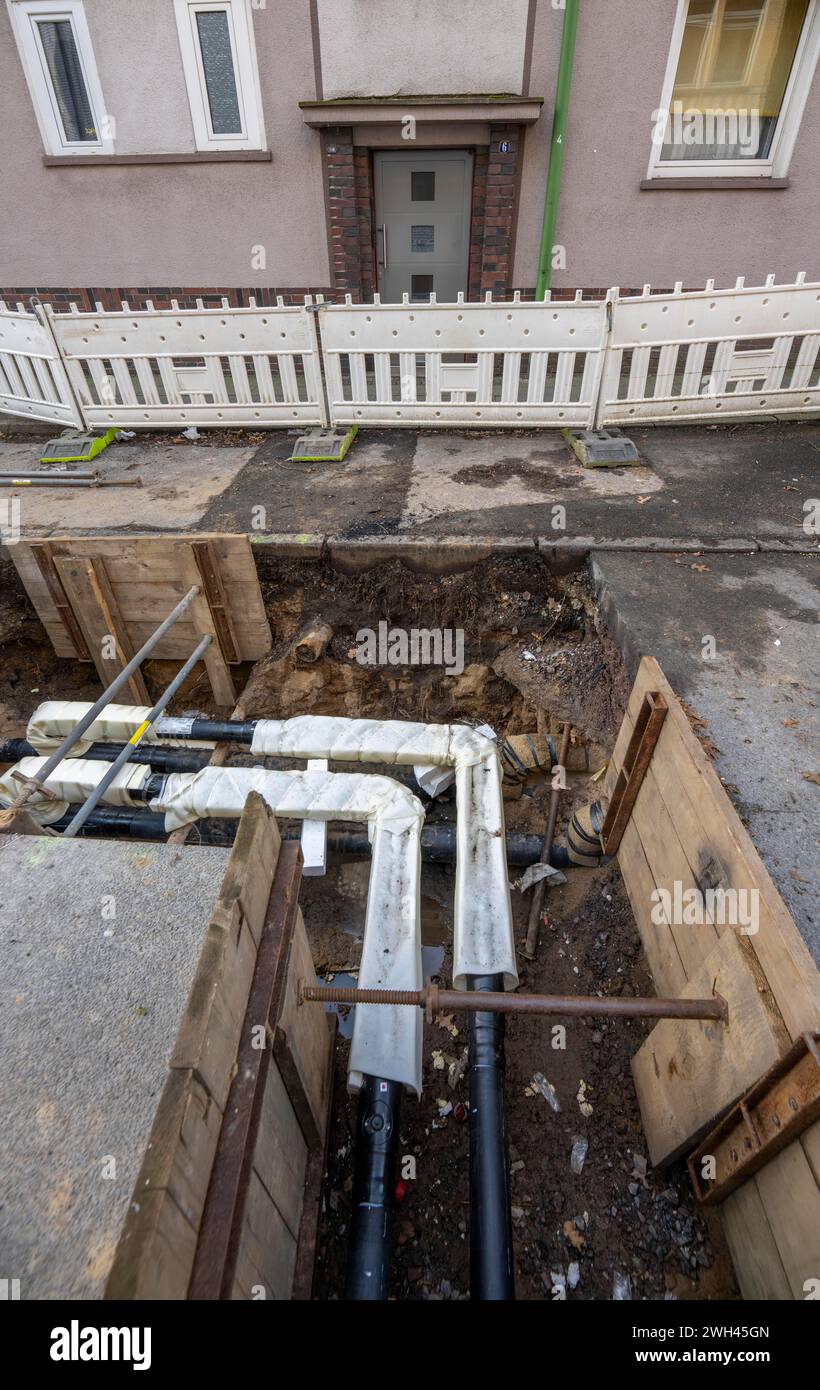 Construction site of a district heating house connection, pipes are ...