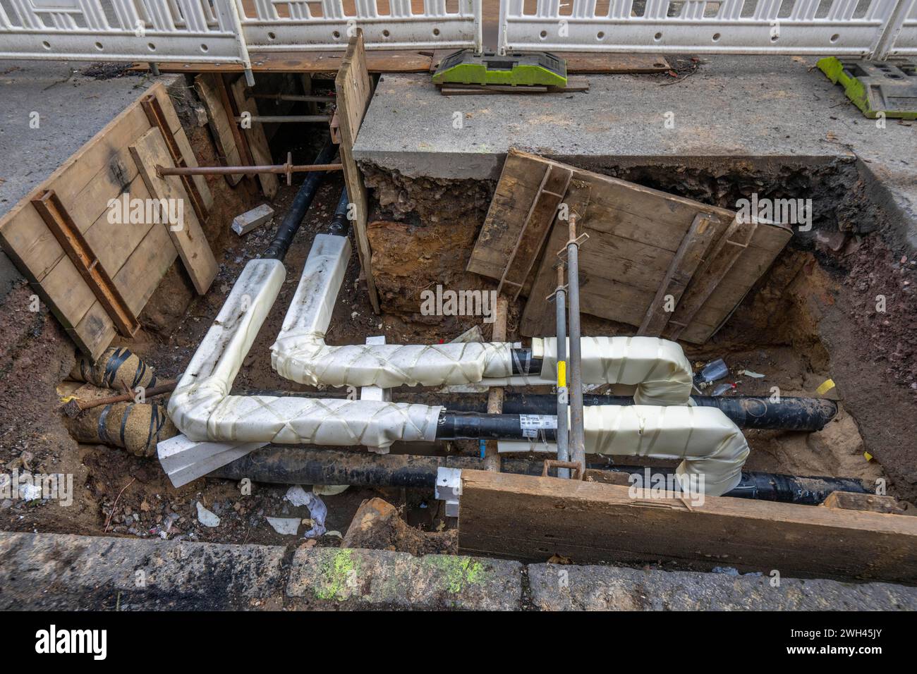 Construction site of a district heating house connection, pipes are ...
