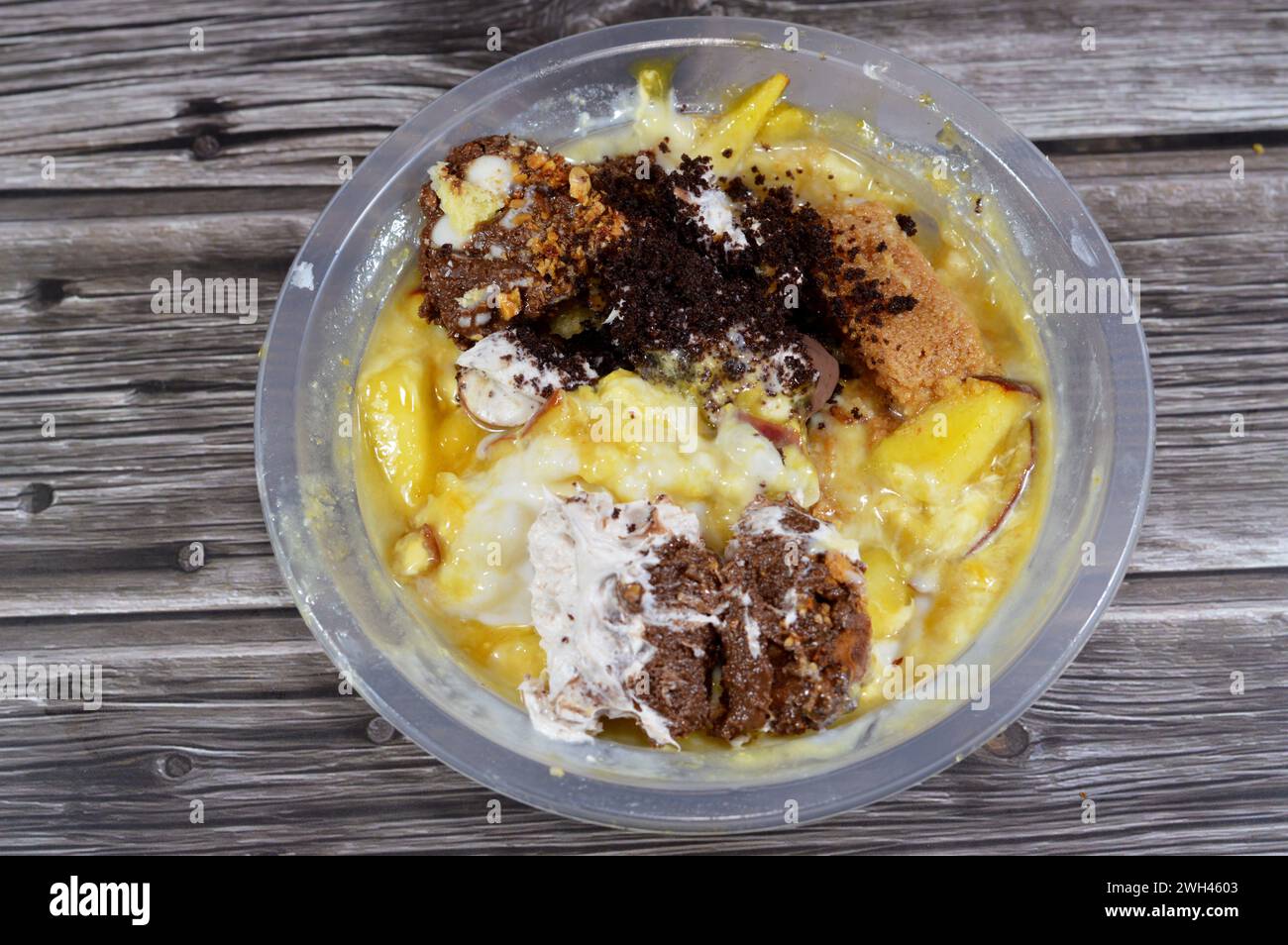 sweet mixture dessert of rice pudding, milk cream qishta, basbousa ...