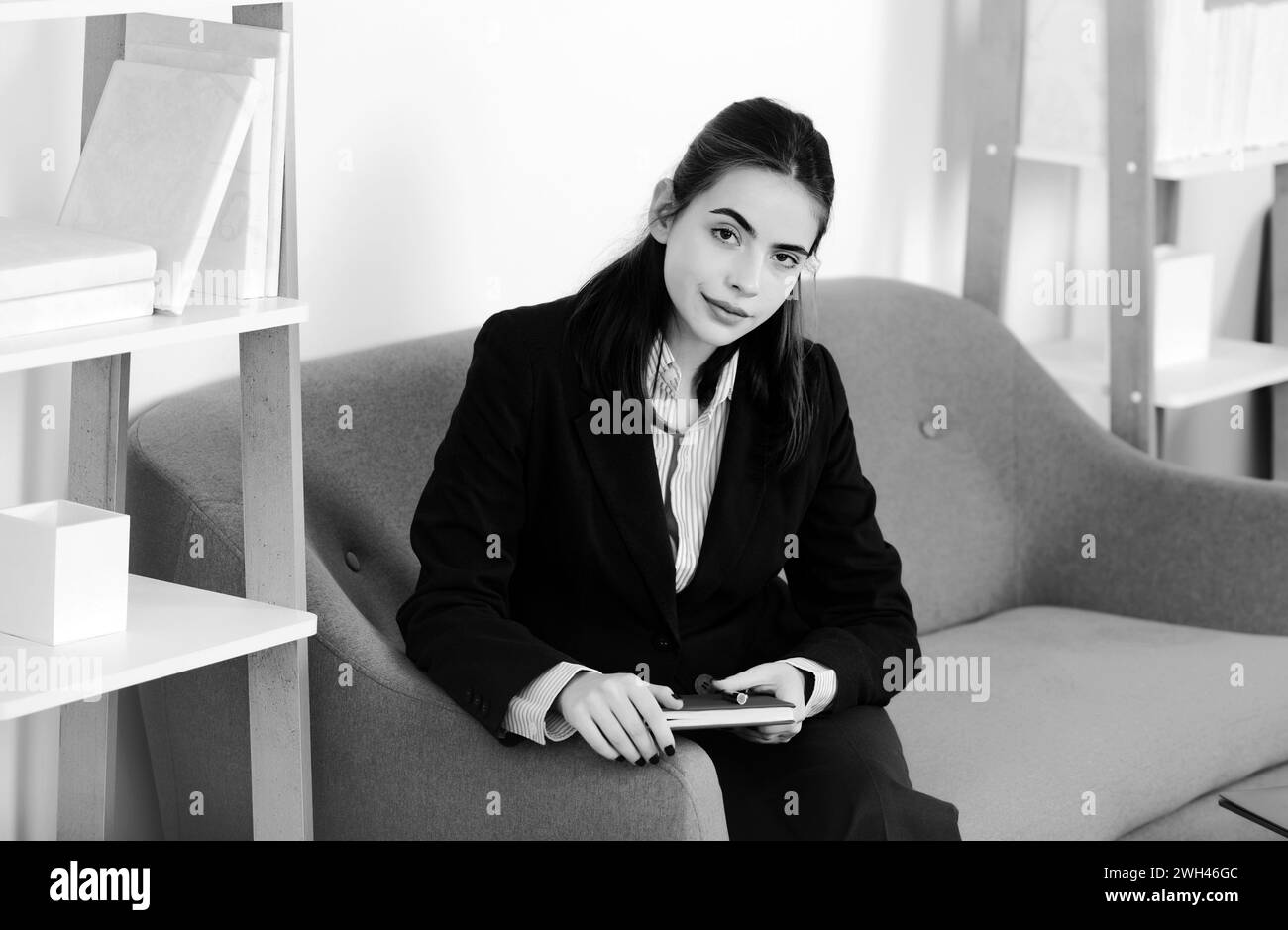 Beautiful attractive secretary woman in a busy modern workplace in ...