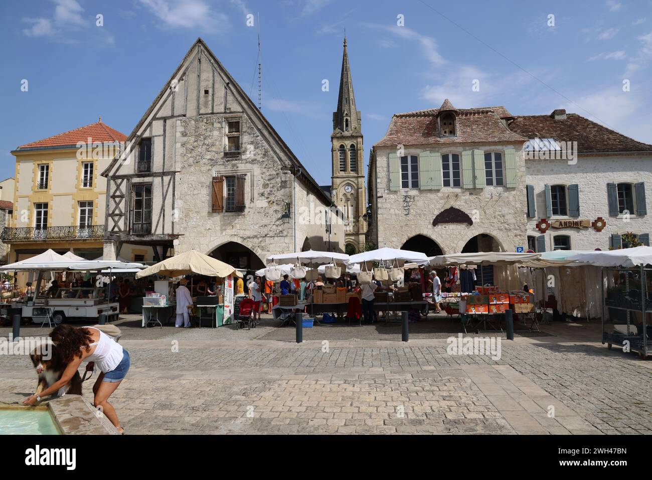 Eymet, the most English of French bastides. Market day on the central ...