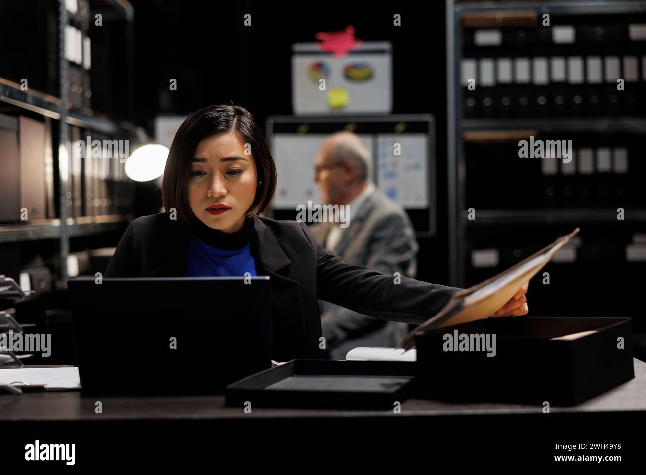 Asian private investigator starting criminal investigation case ...