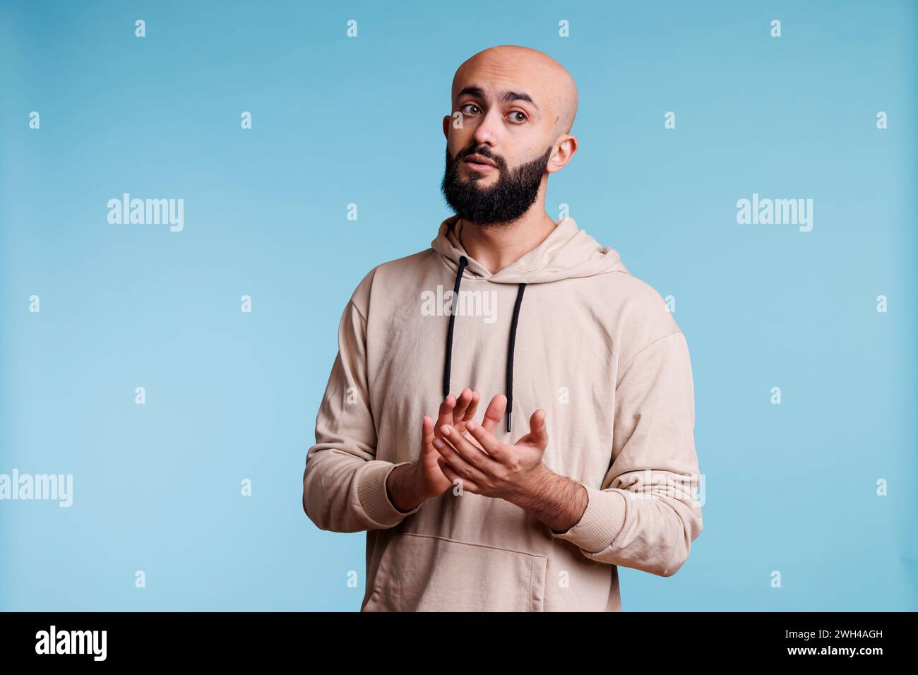 Bald man in hood hi-res stock photography and images - Alamy