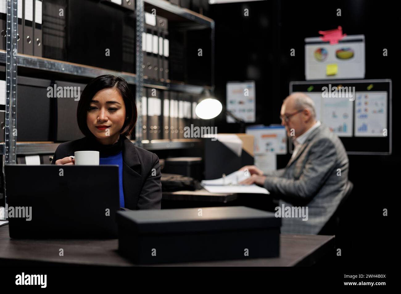 Bookkeeping employees in consultancy bureaucratic workplace filled with ...