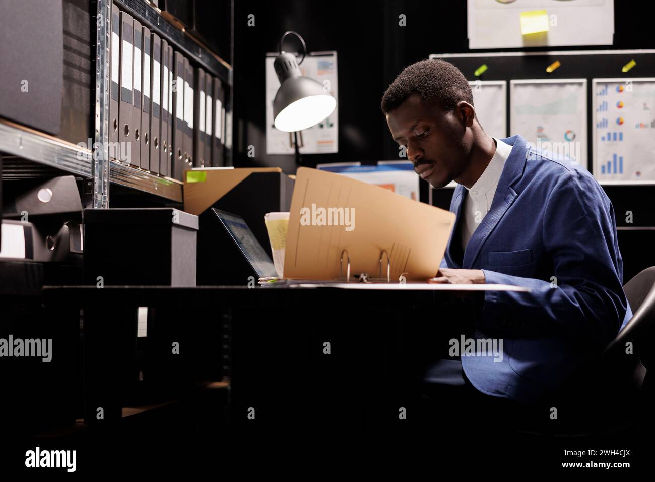 Police officer holding document with confidential case, reading victim ...