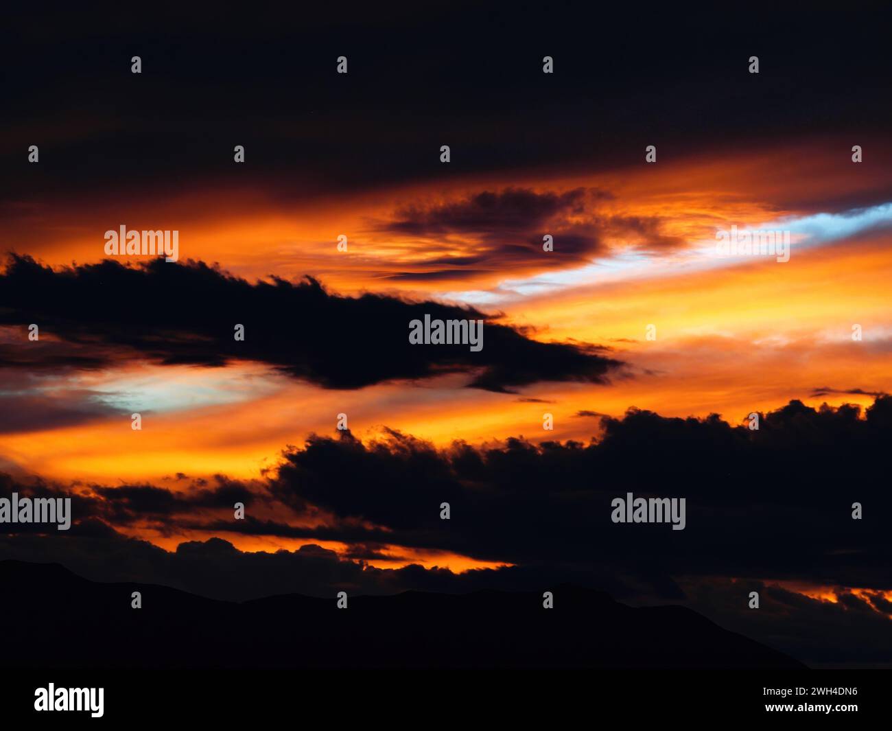 Strong harsh appearing colored sunset Stock Photo - Alamy