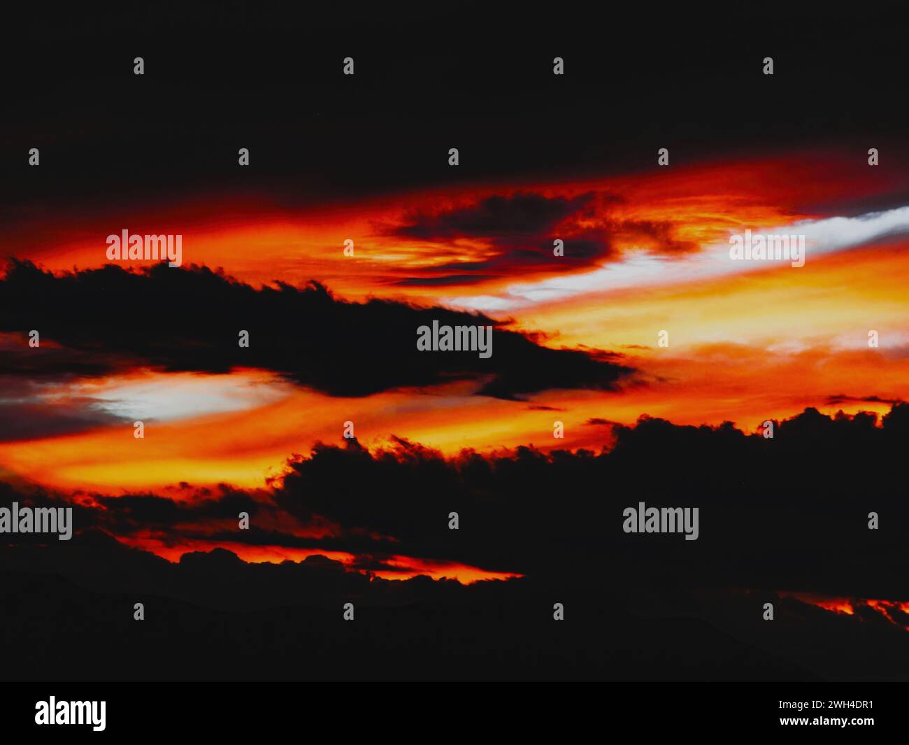 Violent looking multiple colored sunset Stock Photo - Alamy