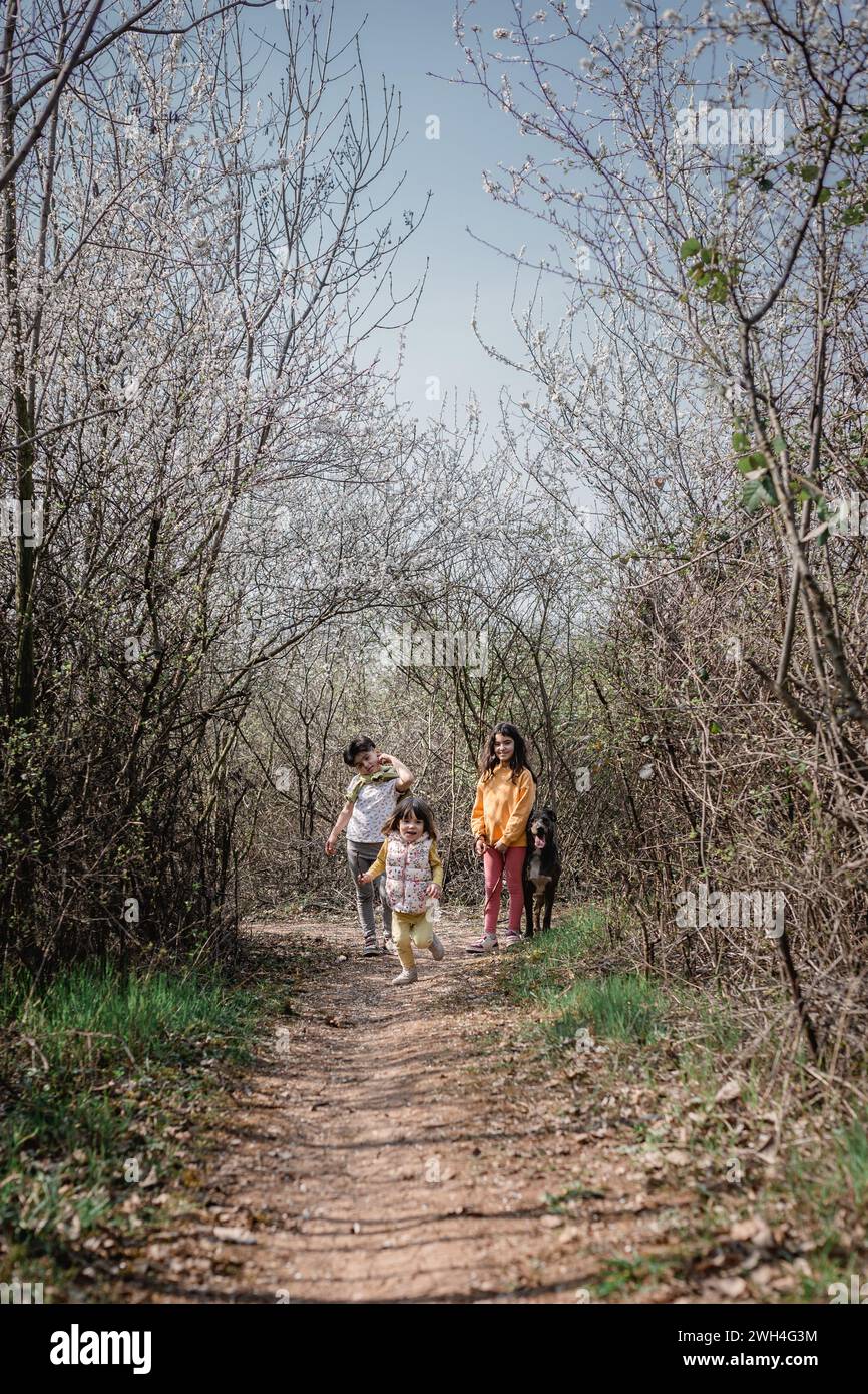 Big family running on road hi-res stock photography and images - Alamy