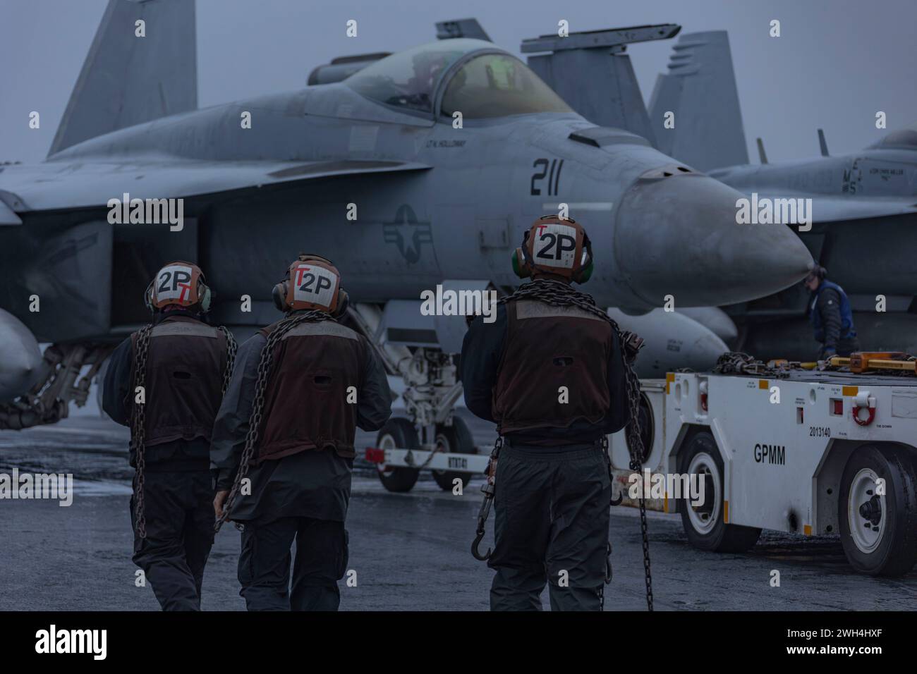 240205-N-LM220-1147 PACIFIC OCEAN (Feb. 5, 2024) Sailors prepare to ...