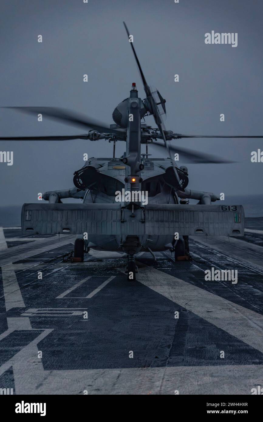 240205-N-LM220-1199 PACIFIC OCEAN (Feb. 5, 2024) An MH-60S Sea Hawk ...