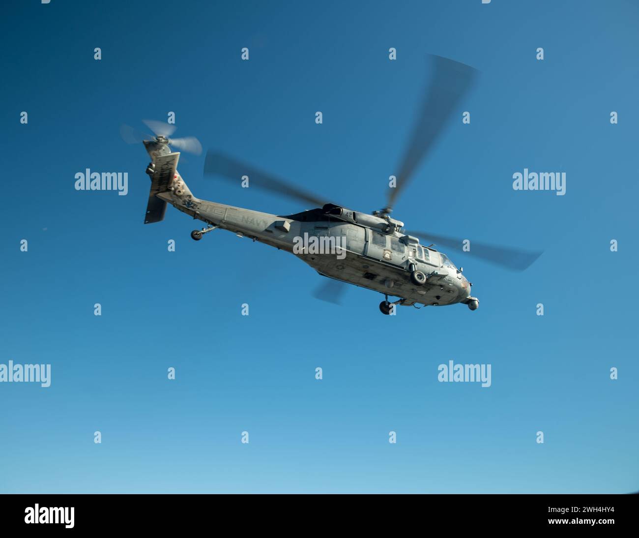 A U.S. Navy MH-60S Sea Hawk attached to Helicopter Sea Combat Squadron ...