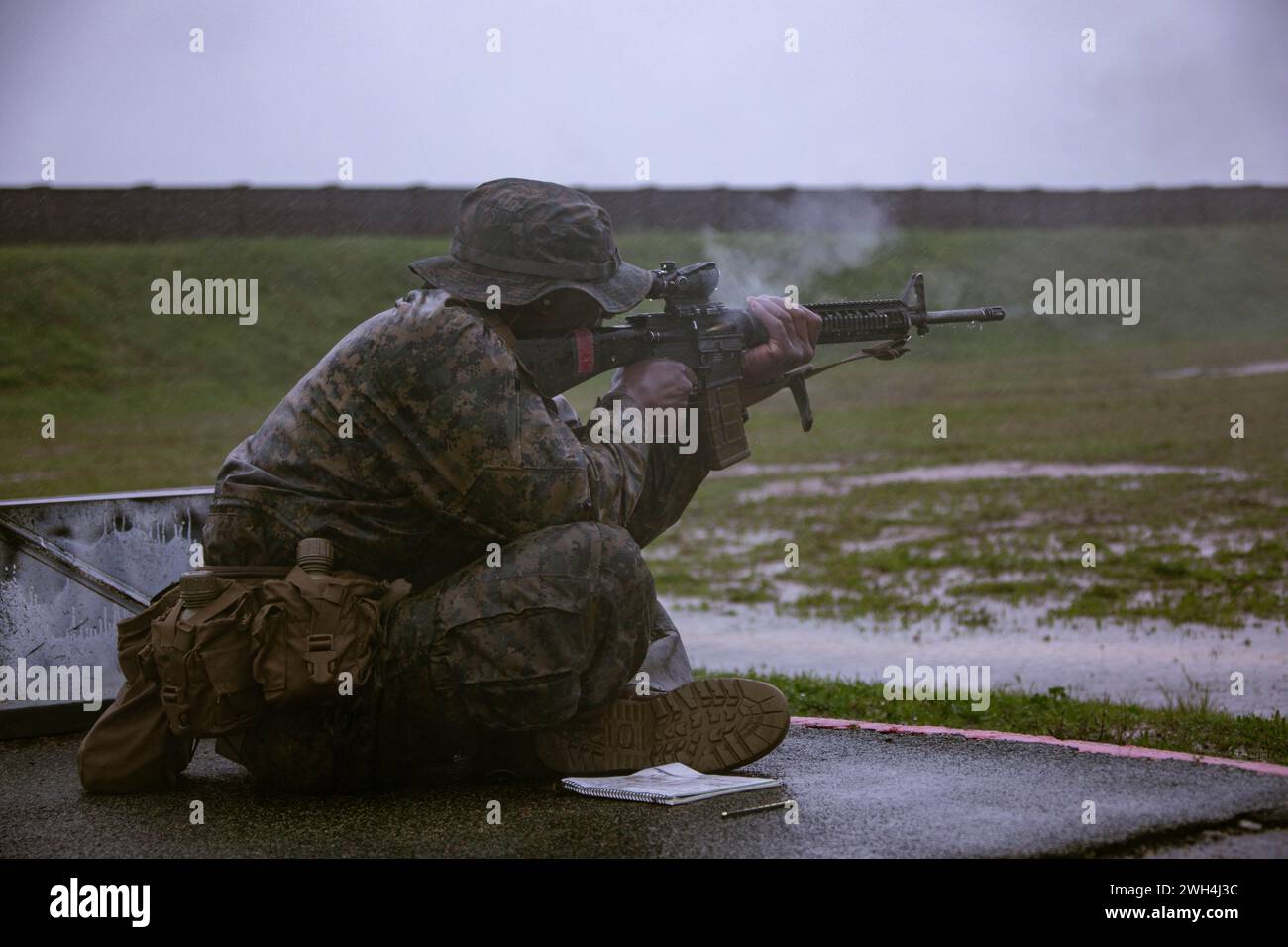 A U.S. Marine Corps recruit with Delta Company, 1st Recruit Training Battalion, engages his ...