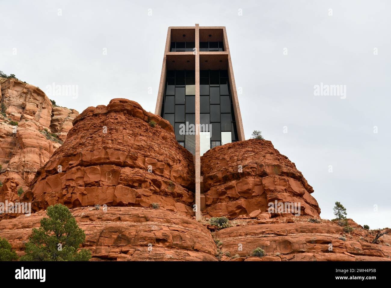 Chapel of the Holy Cross - Cross shaped church built into rock cliffs ...