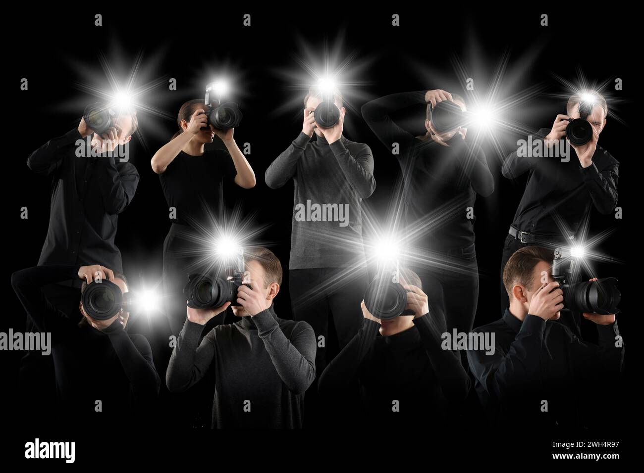 Group of photographers with cameras on black background. Paparazzi taking pictures with flashes ...