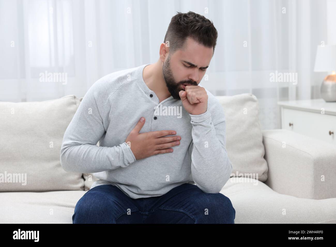 Sick male coughing symptoms bronchitis hi-res stock photography and ...