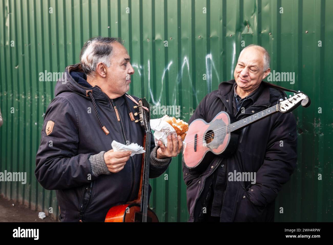 Picture of a typical Balkans band, musicians, two men, guitarists ...