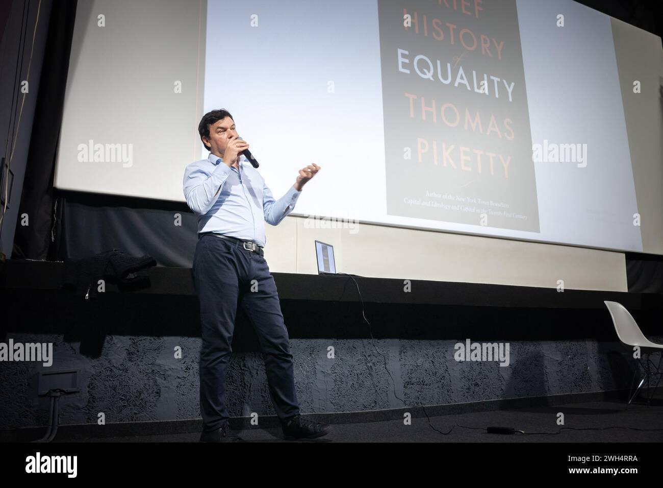Picture of a portrait of Thomas Piketty talking during a conference in ...