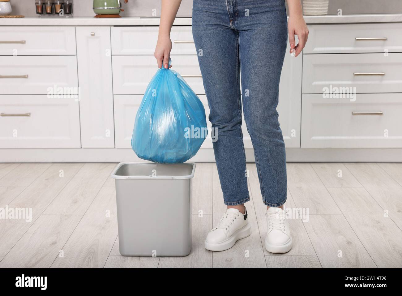 Taking out rubbish female hi-res stock photography and images - Alamy