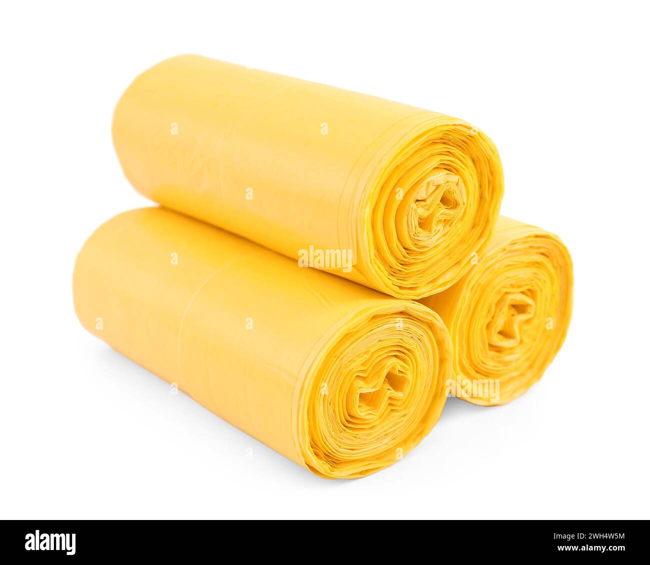 Rolls of yellow garbage bags isolated on white Stock Photo - Alamy