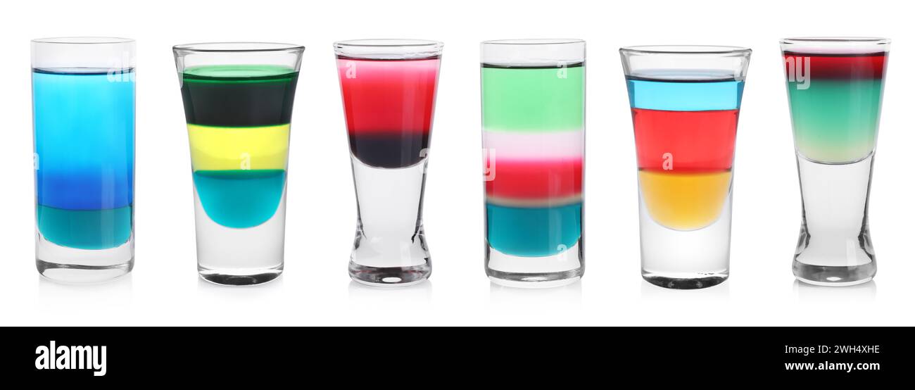 Different shooters in shot glasses isolated on white, set Stock Photo ...