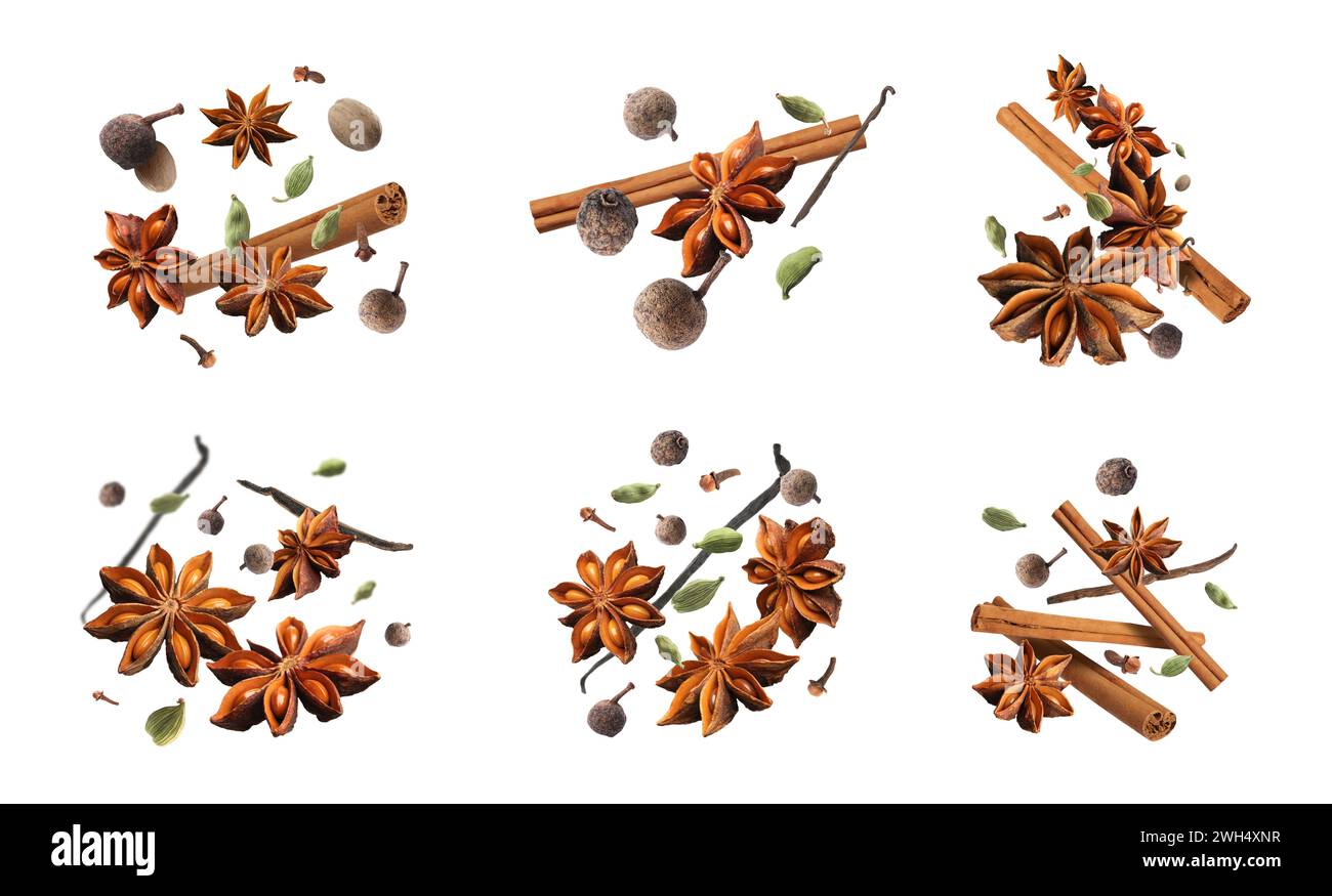 Different aromatic spices falling on white background Stock Photo - Alamy