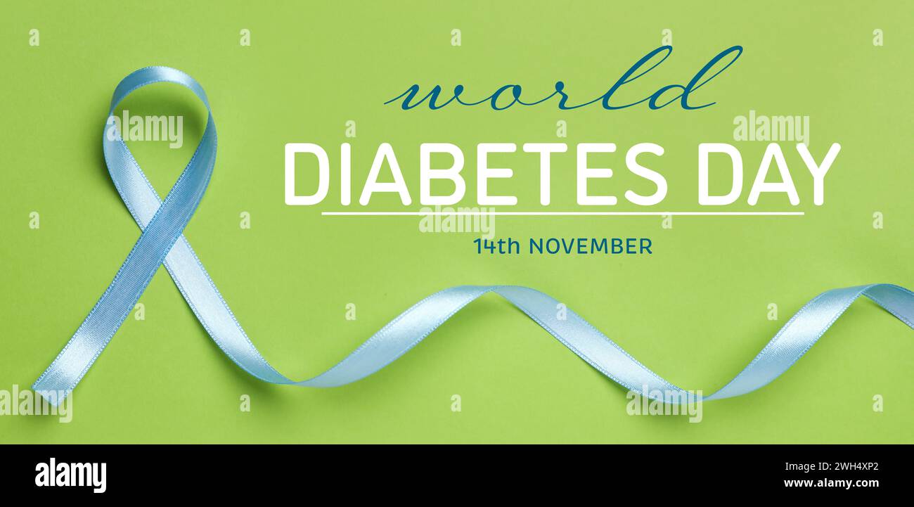 World Diabetes Day. Light blue ribbon on green background, top view ...