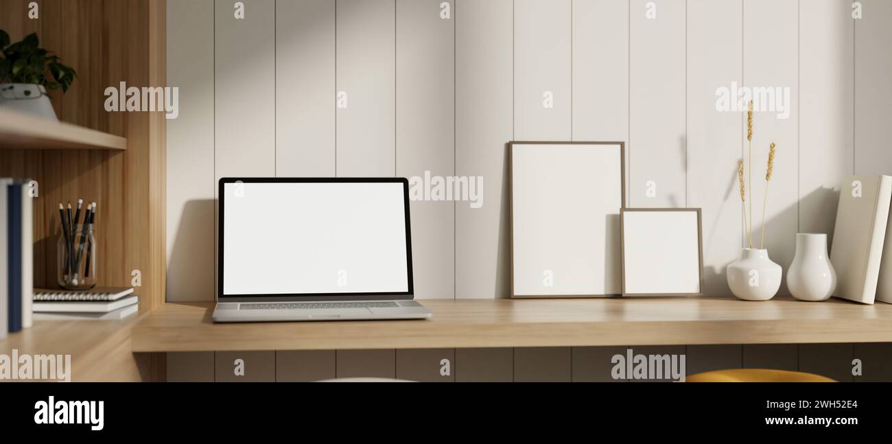 Home workspace with a white-screen laptop mockup, frames mockup ...