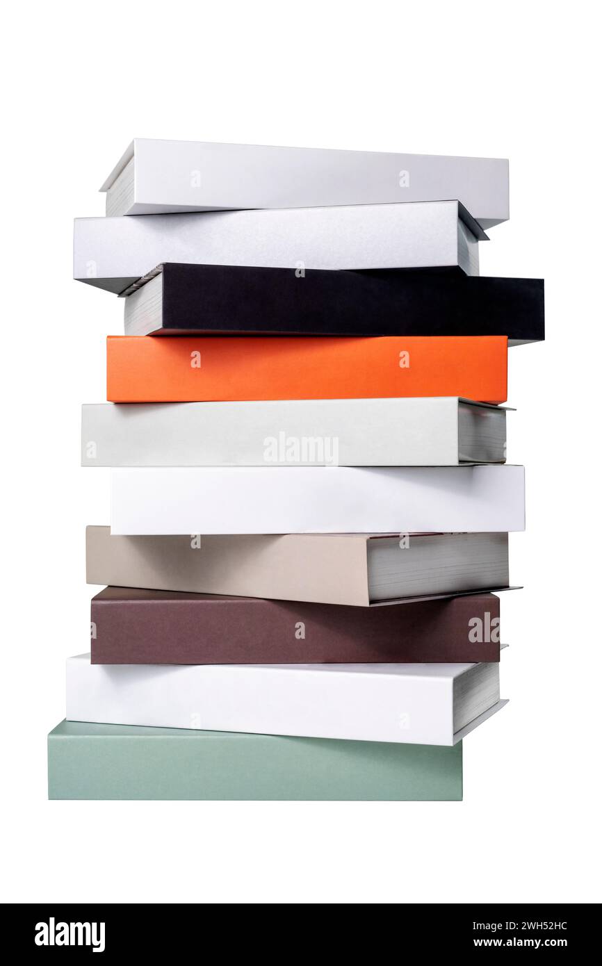 A stack of hardcover books is isolated over a white background ...