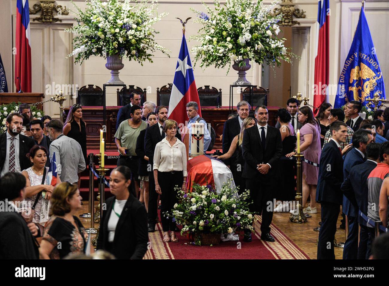 Santiago, Chile. 7th Feb, 2024. People mourn by the coffin of former ...