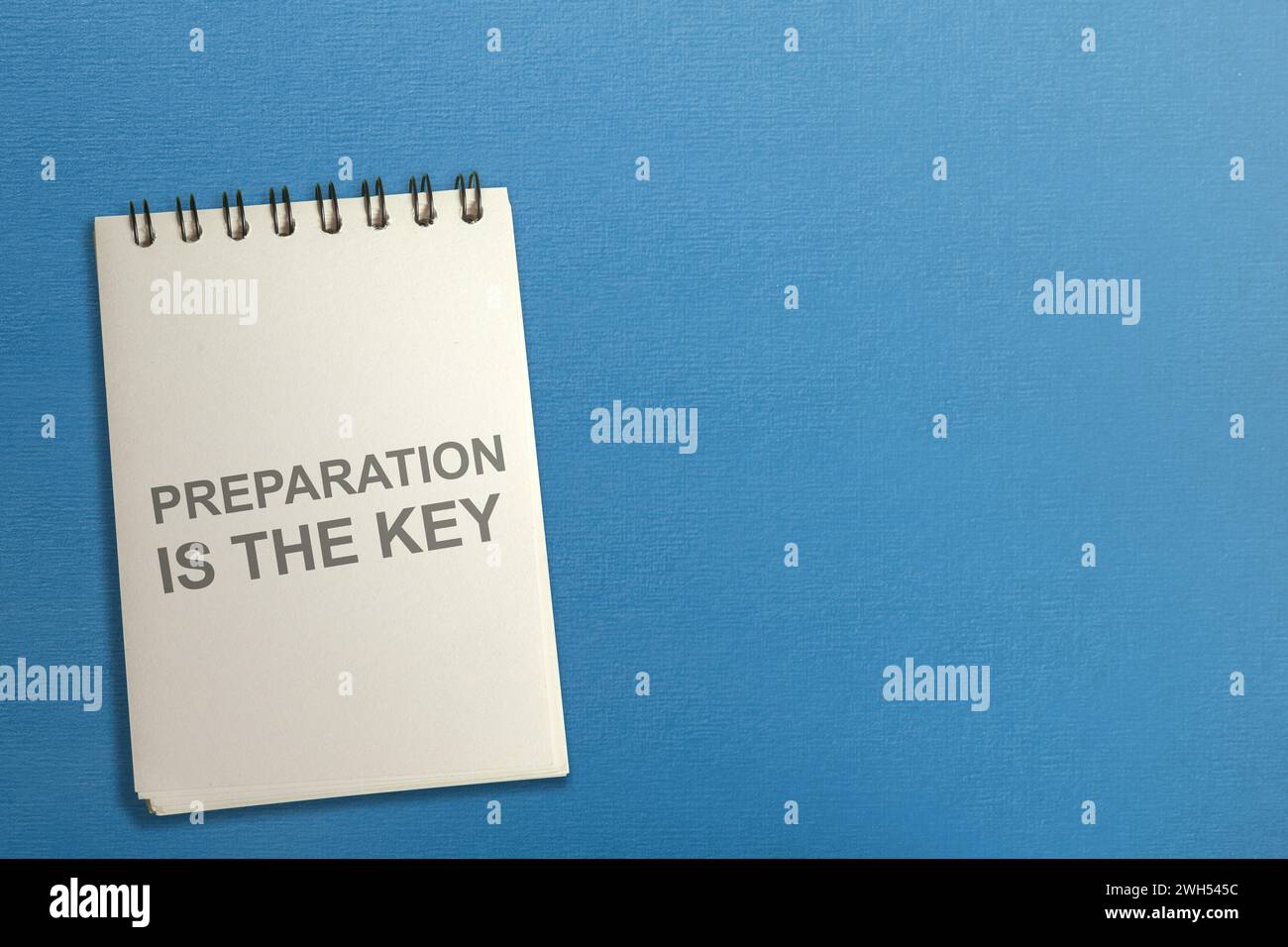 Note with 'Preparation is the key' text over the colored background ...