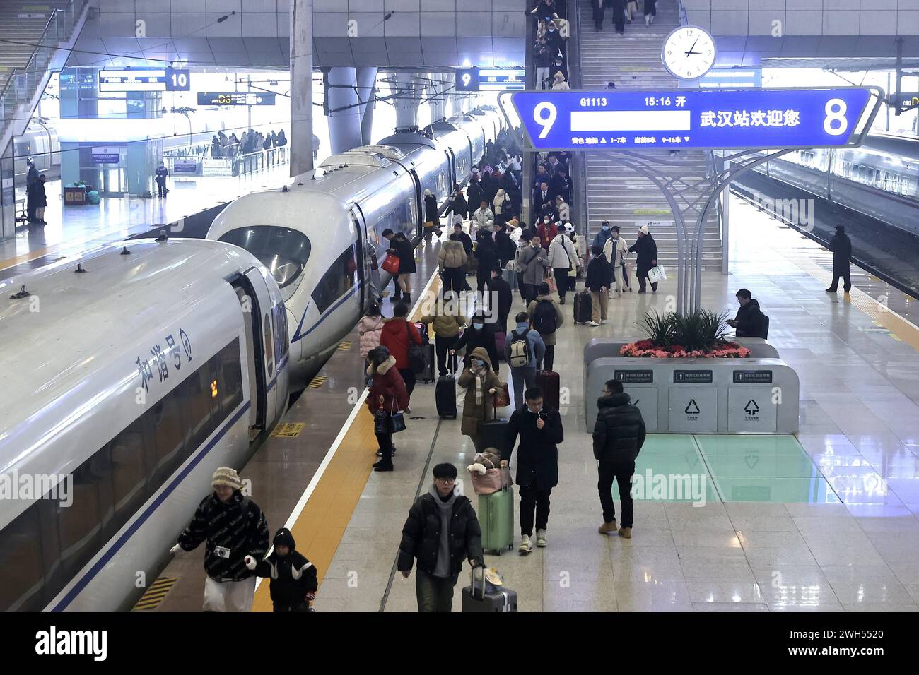 **CHINESE MAINLAND, HONG KONG, MACAU AND TAIWAN OUT** Passengers wait ...
