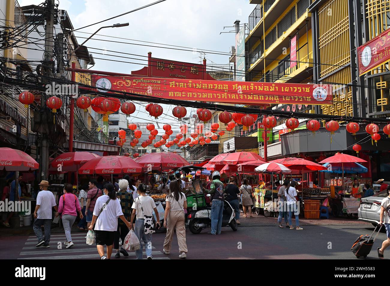 Busy scene at traditional gate entrance to the Guan Yu Shrine at ...