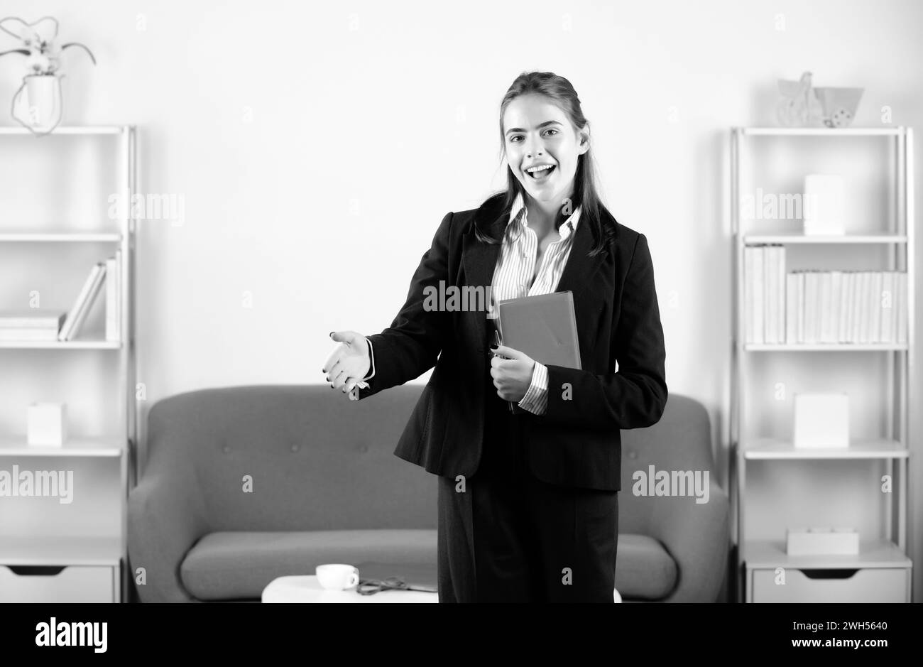 Portrait of young businesswoman accountant in suit or formal wear ...