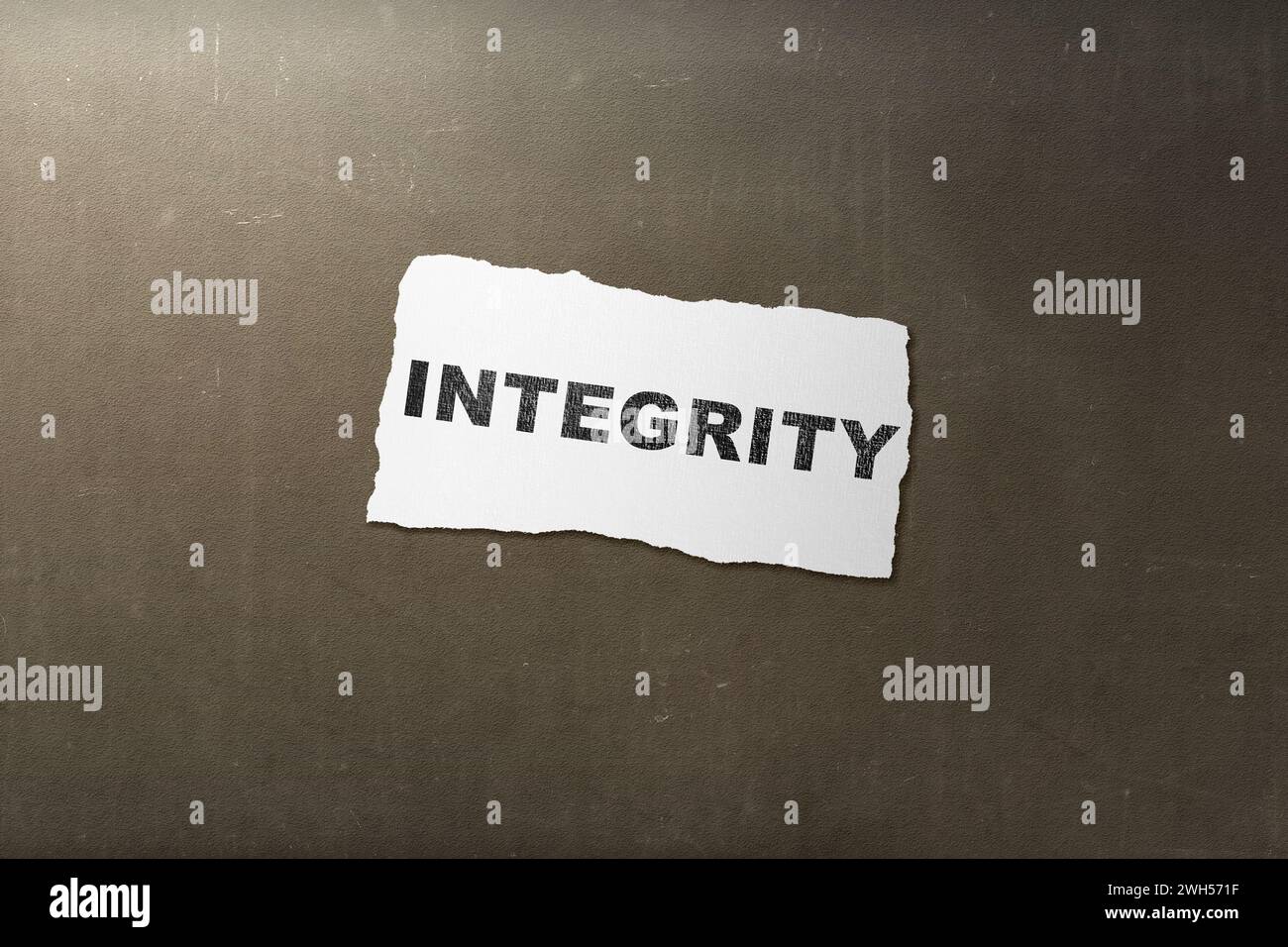 Ripped paper with integrity text on a black background. Reputation ...