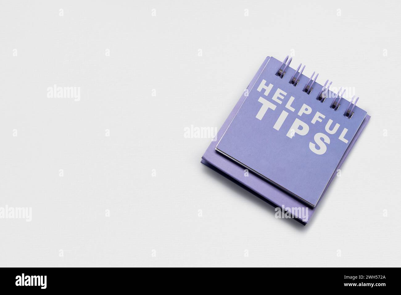 Notes with 'Helpful tips' text on white background. Tips and advice ...