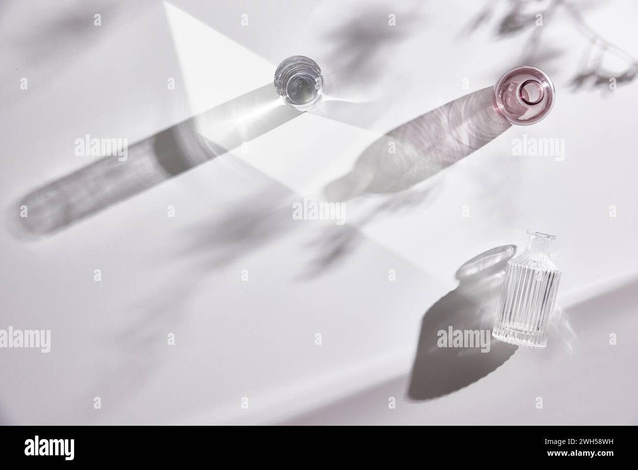 Natural texture of various glass cups on a table with sunlight ...