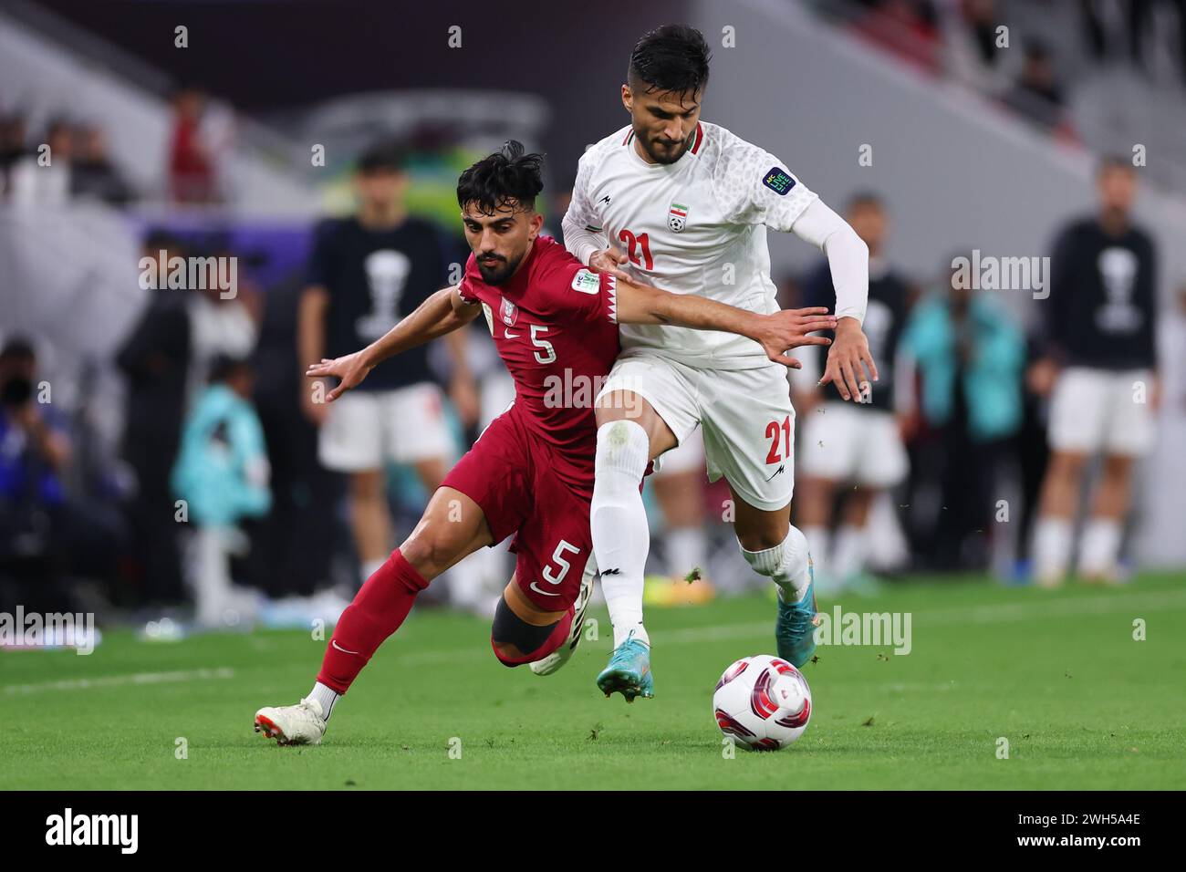 Doha, Qatar. 7th Feb, 2024. (L to R) Tarek Salman (QAT), Mohammad Mohebi (IRI) Football/Soccer ...