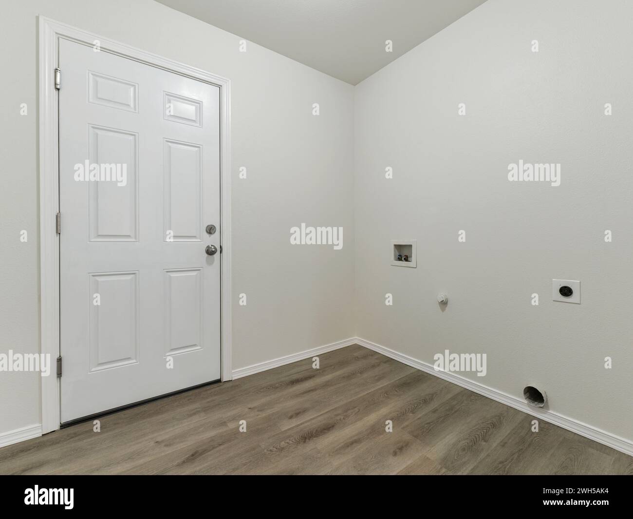 Modern residential empty laundry room interior Stock Photo - Alamy