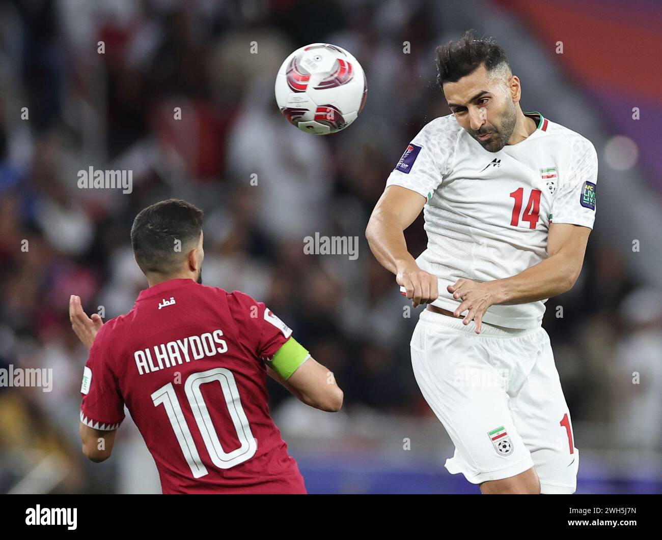 Doha, Qatar. 7th Feb, 2024. Saman Ghoddoos (R) of Iran vies with Hasan ...