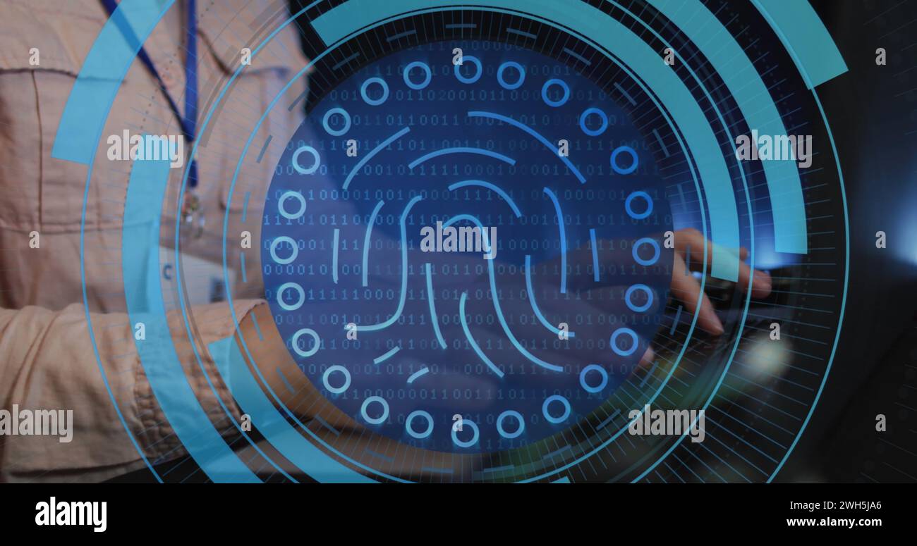 Image of fingerprint in circles over hands of caucasian man typing on ...