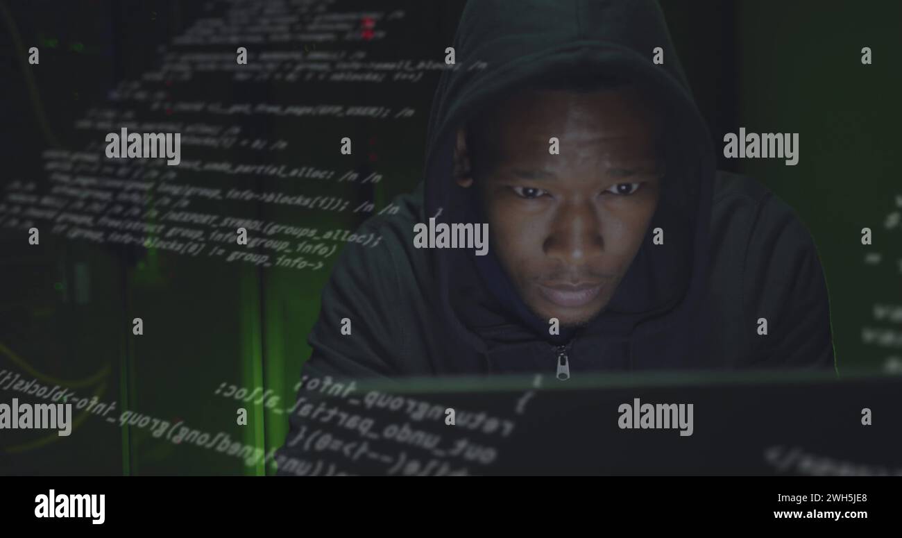 Image of data processing over african american male hacker in server ...