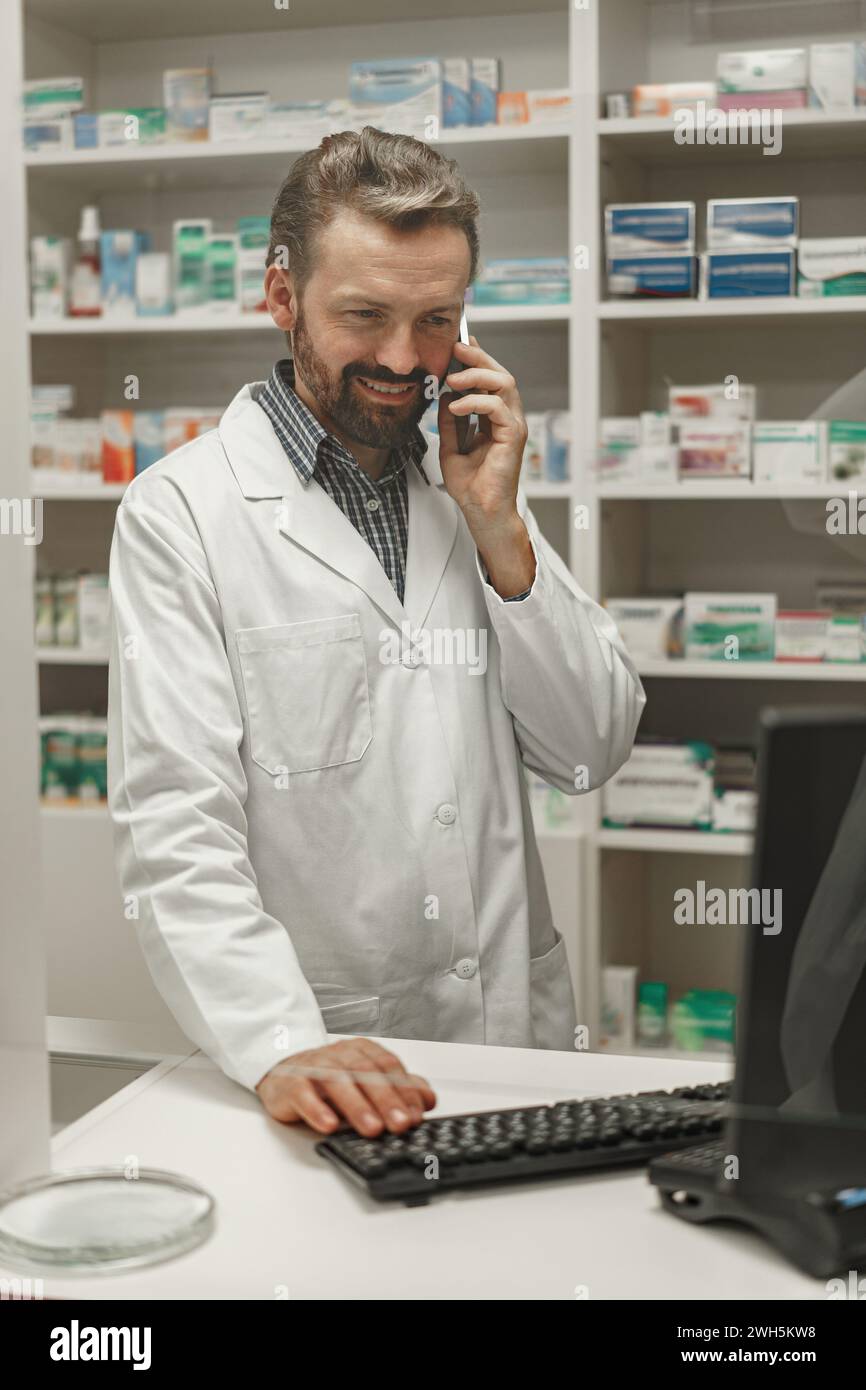 Portrait male apothecary working hi-res stock photography and images ...