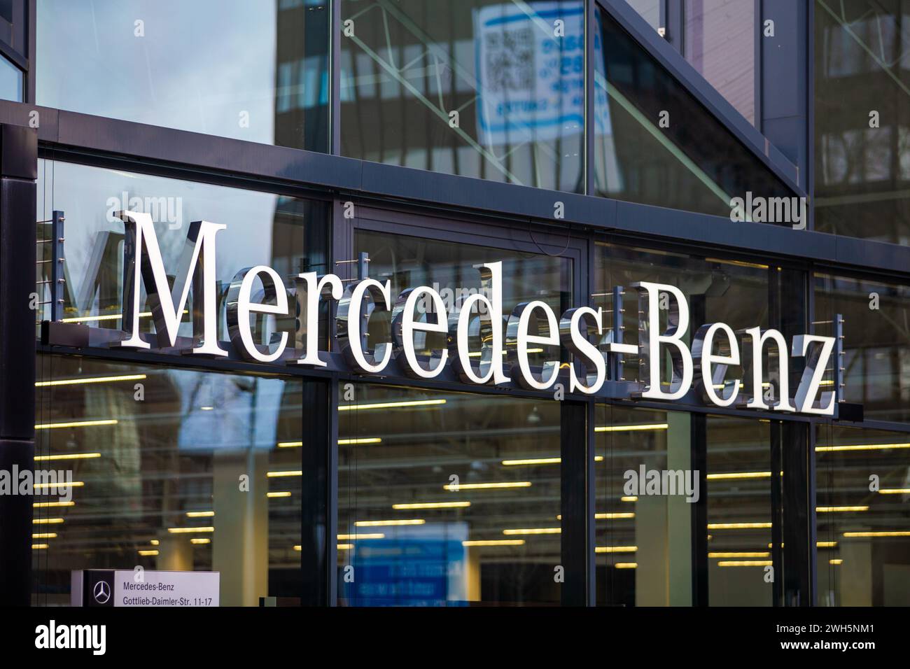 Lettering on the Mercedes Benz AG car dealership at the Mannheim branch ...