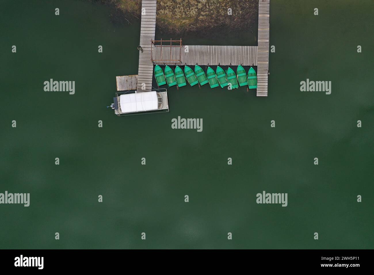 Aerial drone view of a lake boat dock. Flying above a vessel pier Stock ...